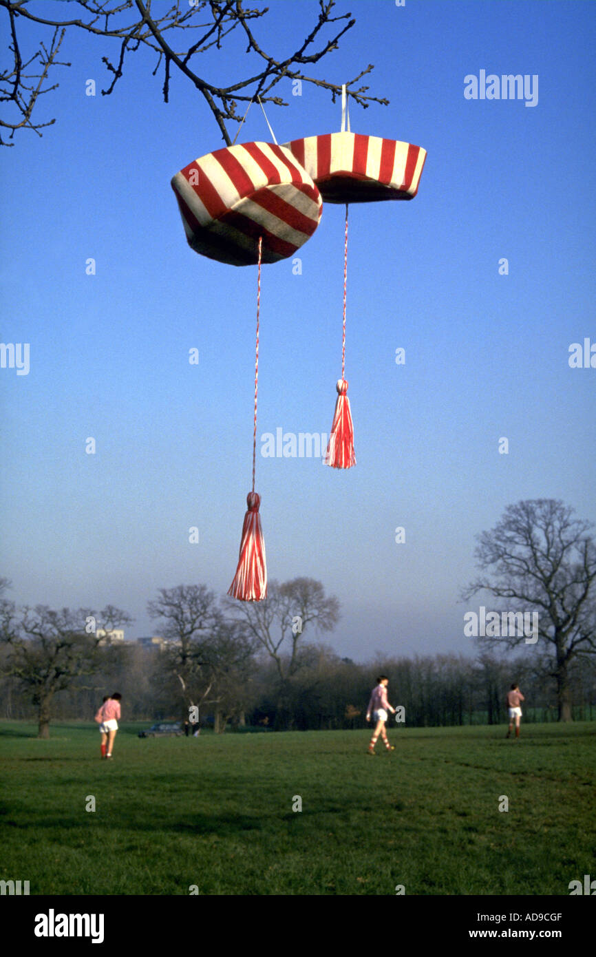 Fez's hang from the trees during the playing of the taditional Harrow ...