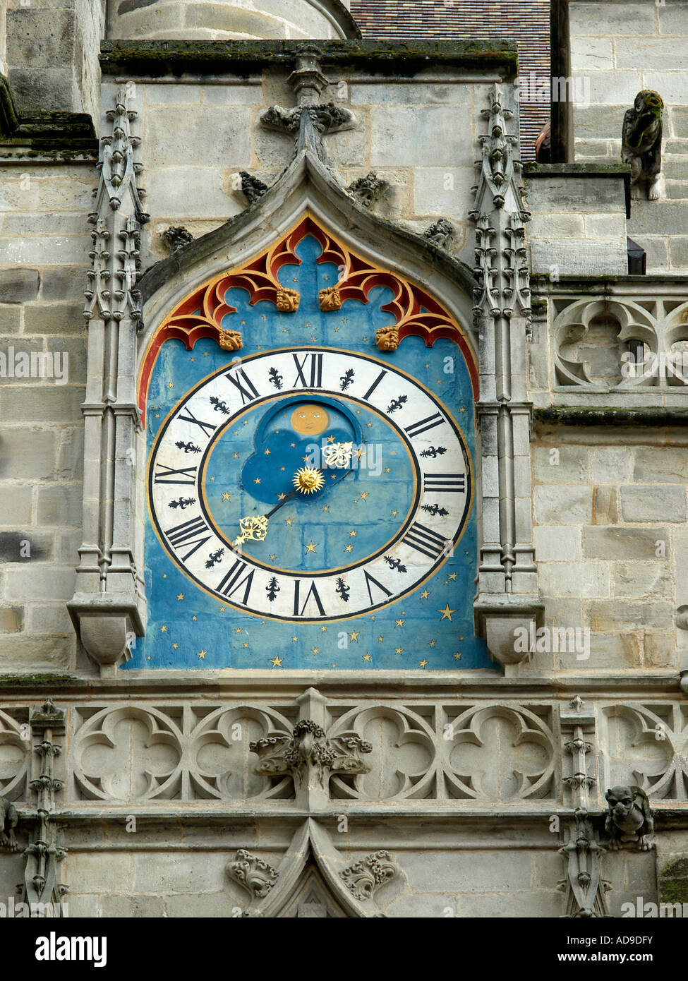 old clock showing the phase of the moon on facade of the cathedral ...