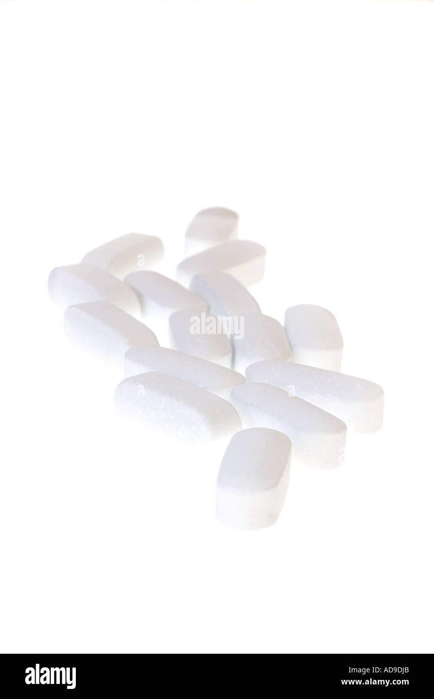 Calcium tablets on white background Stock Photo - Alamy
