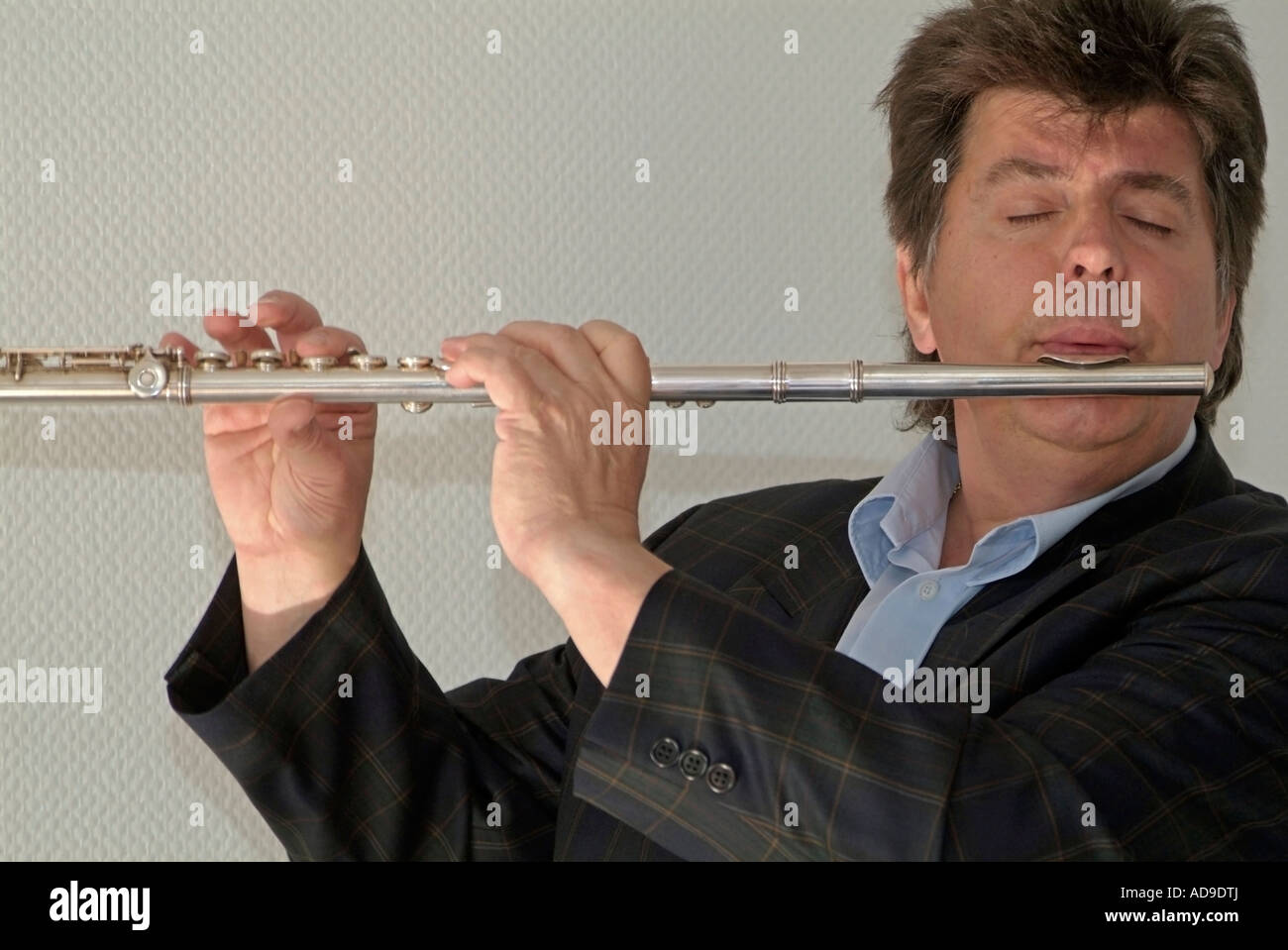 musician playing transverse flute Stock Photo - Alamy