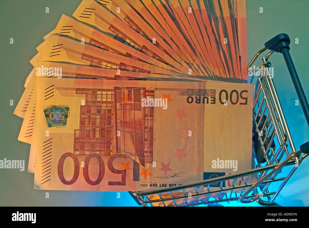 spending money lot of banknotes in a shopping cart Stock Photo - Alamy
