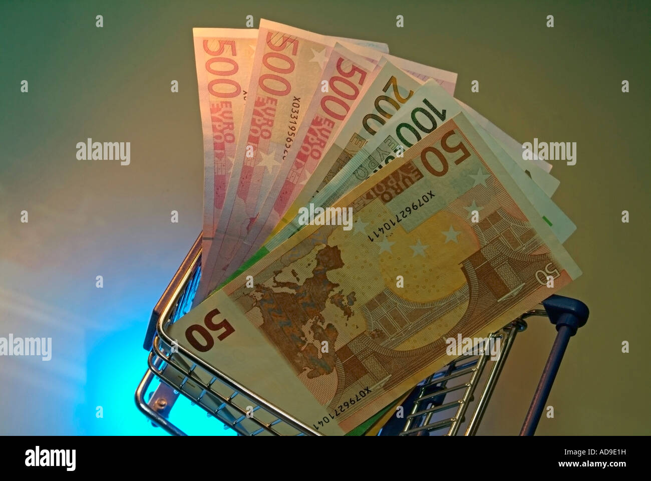 spending money lot of banknotes in a shopping cart Stock Photo - Alamy