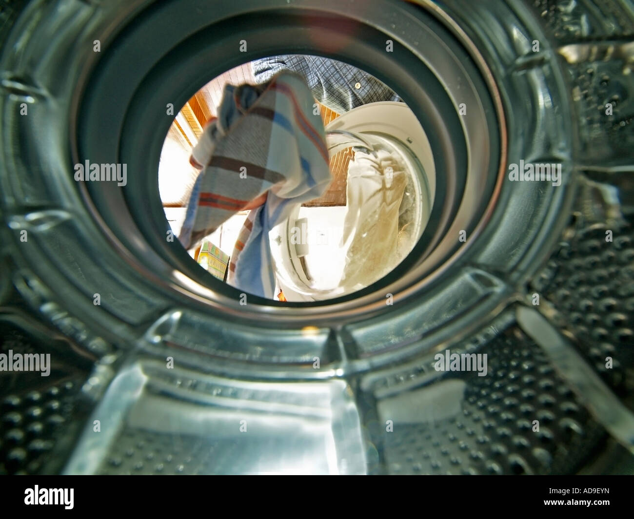filling washing machine view from inside the machine Stock Photo - Alamy