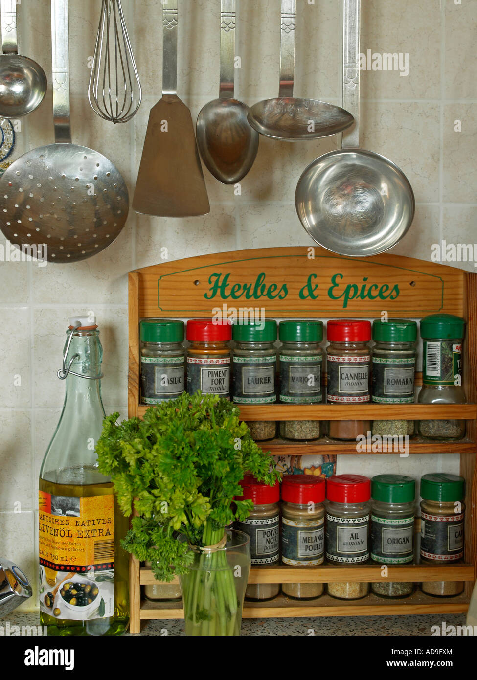 spices and cooking utensils in kitchen Stock Photo - Alamy