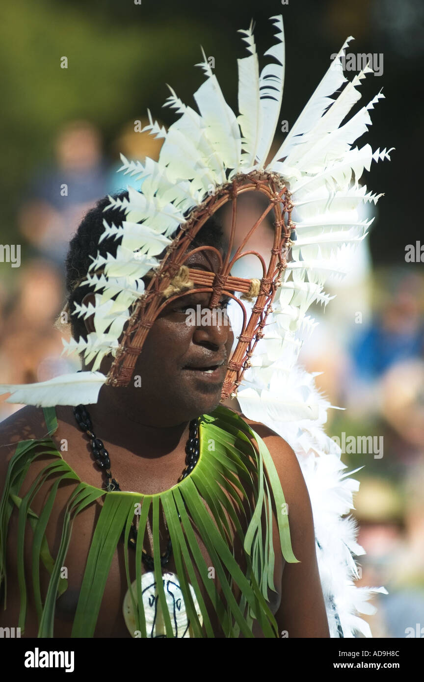 Ti dance troupe member wearing the distinctive inverted U shape and the ...