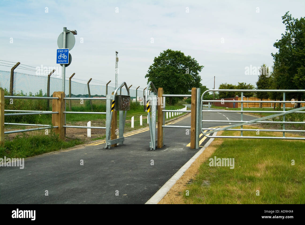 Country lane blocked with barrier which only allows cyclists and ...