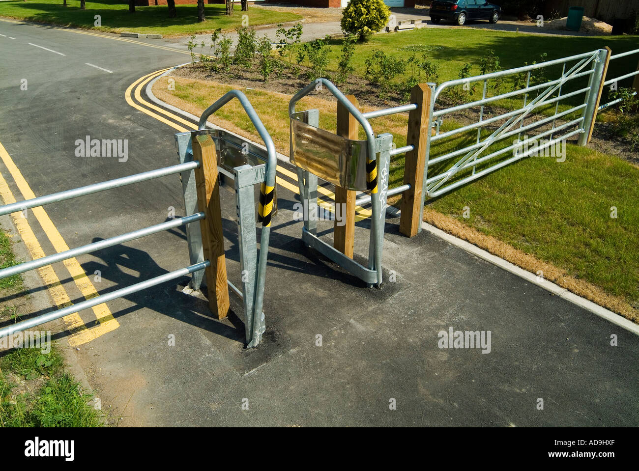 Country lane blocked with barrier which only allows cyclists and ...