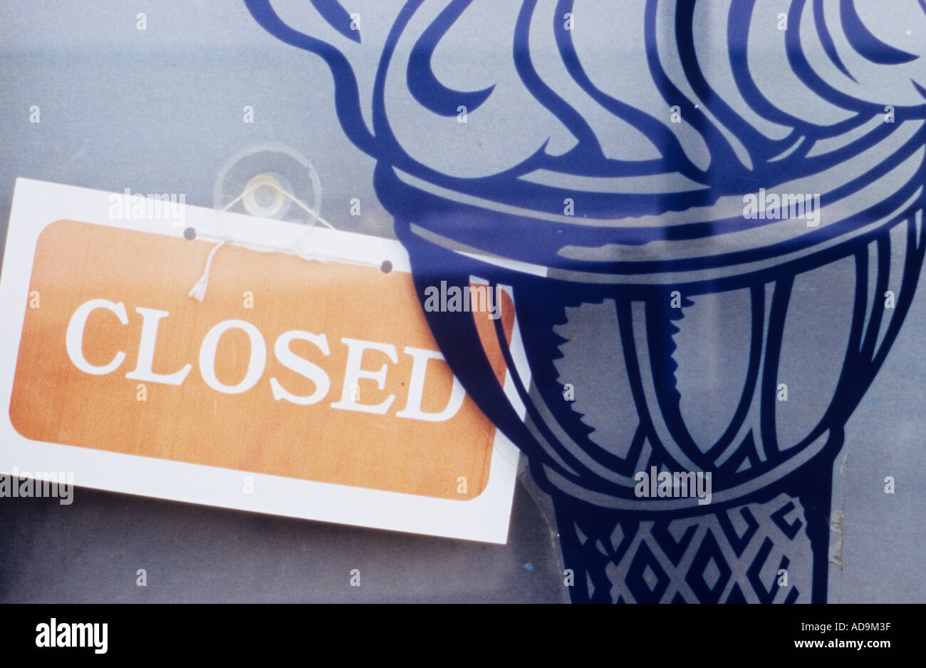 Detail of iconic image of an ice cream cone on a shop or kiosk window ...