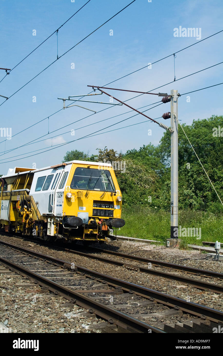 Maintenance train approaching a level crossing on West Coast Railway ...