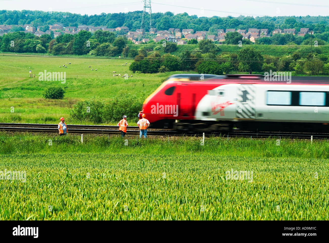 Railway workers doing equipment safety checks on equipment on the West ...