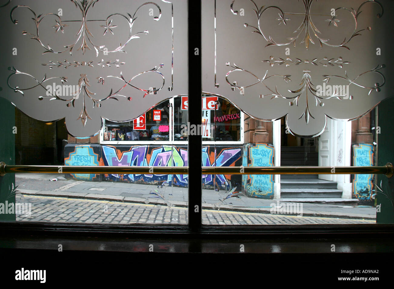 View through etched pub window Newcastle upon Tyne UK Stock Photo - Alamy
