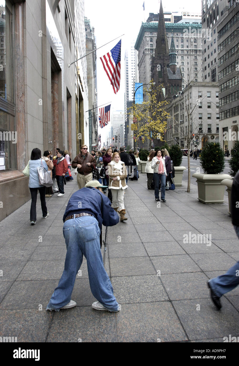 Crippled man begging on the streets of Manhattan New York Stock Photo ...