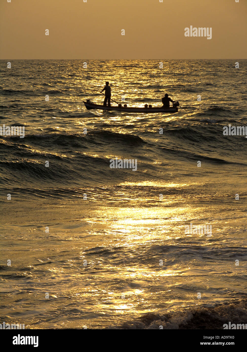 Fishing at sunset, Puthenthope beach, Trivandrum, Kerala, South India ...