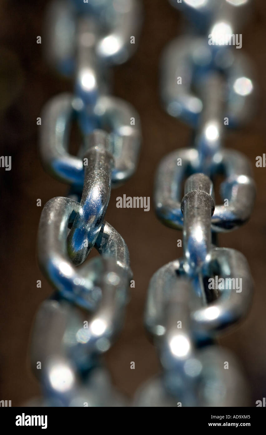 Two parallel, new, shiny stainless steel chains Stock Photo - Alamy