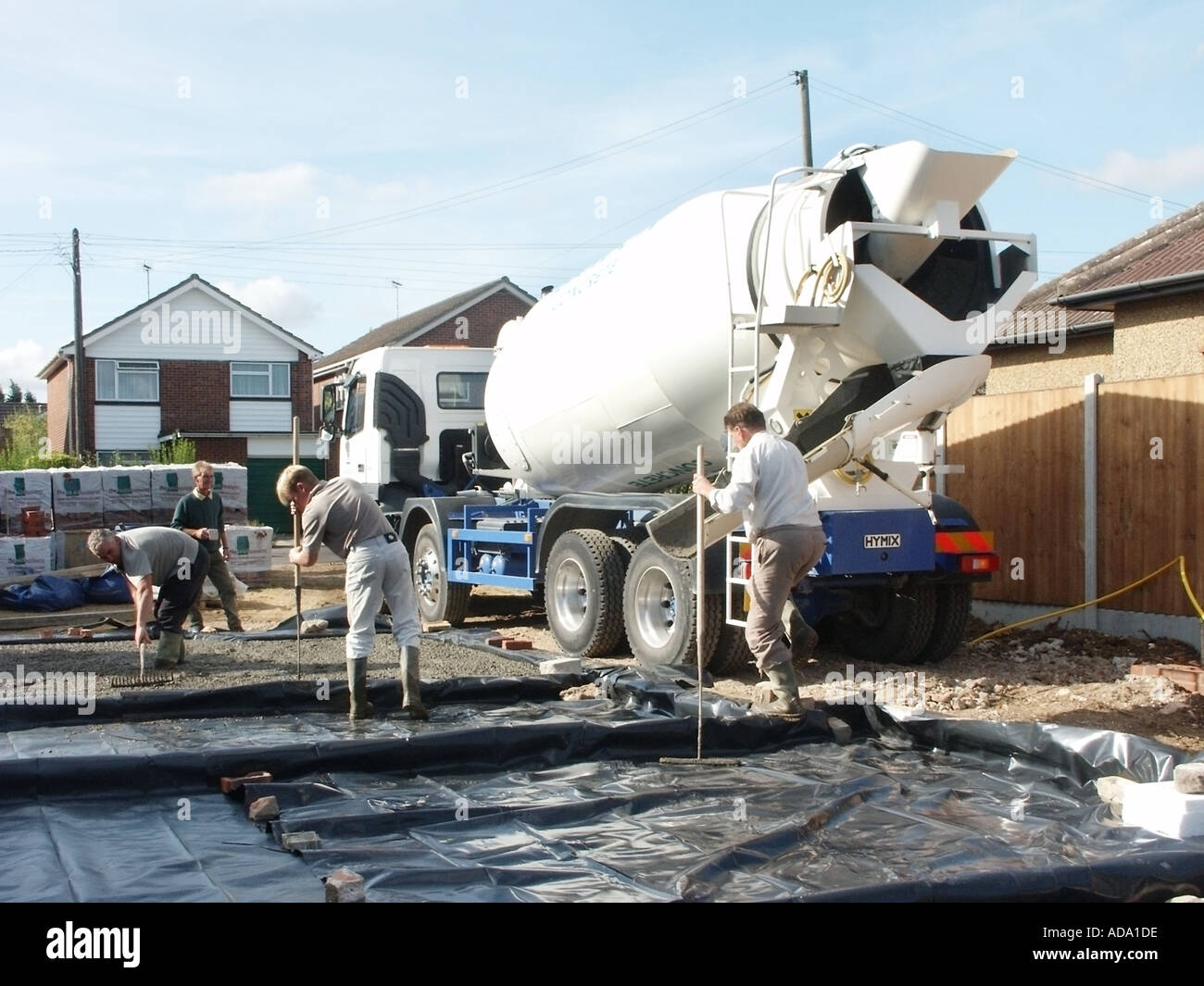Ready Mix Concrete Trucks Pouring