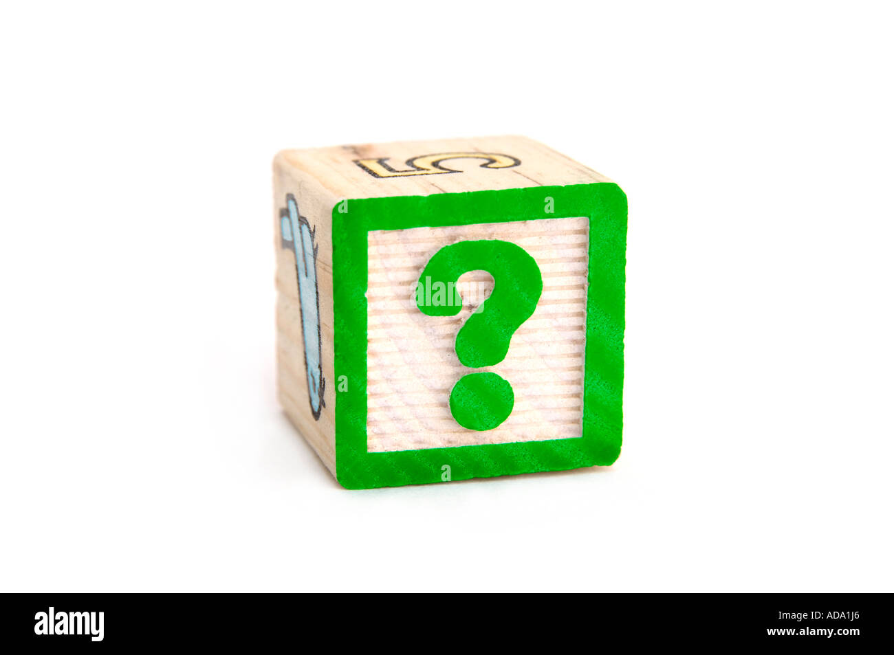 Childs wooden block with a question mark Stock Photo - Alamy