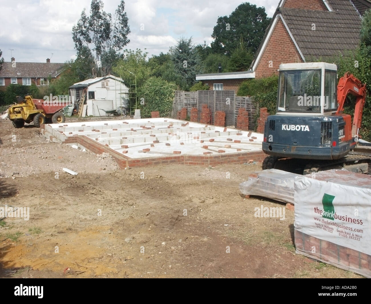 Building site new detached house under construction foundations ...
