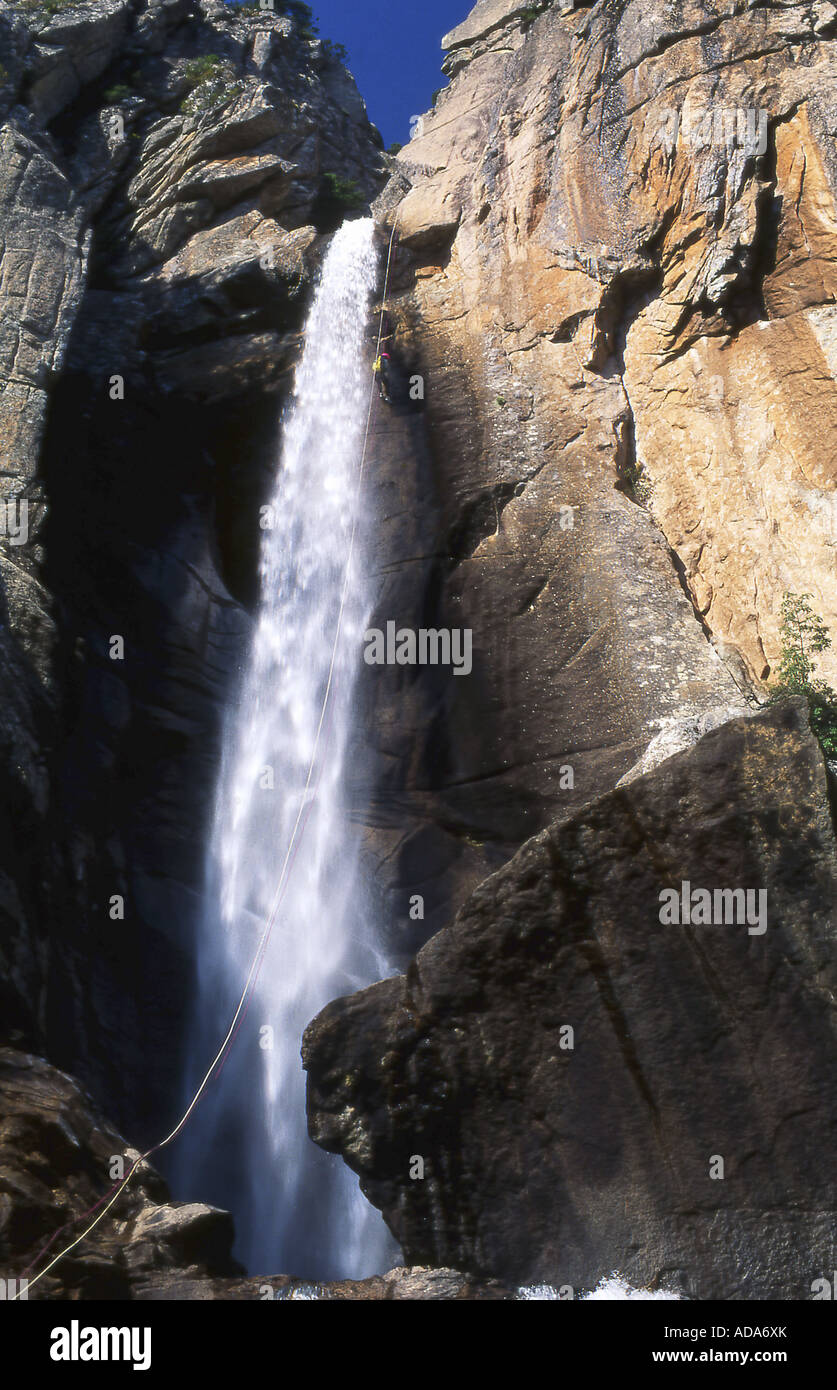 canyoning in the big waterfall of Piscia di Gallu in south of Corsica ...