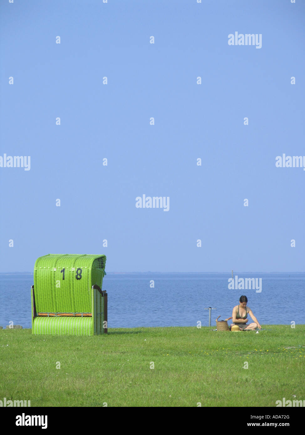 Reading on the beach chair hi-res stock photography and images - Alamy