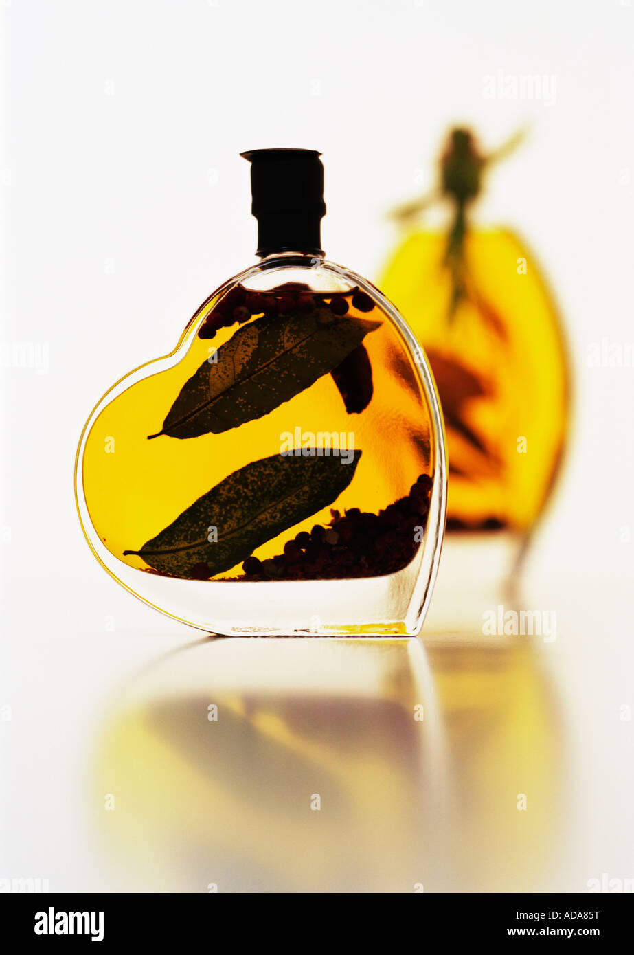 Oil in heart shape container hi-res stock photography and images - Alamy