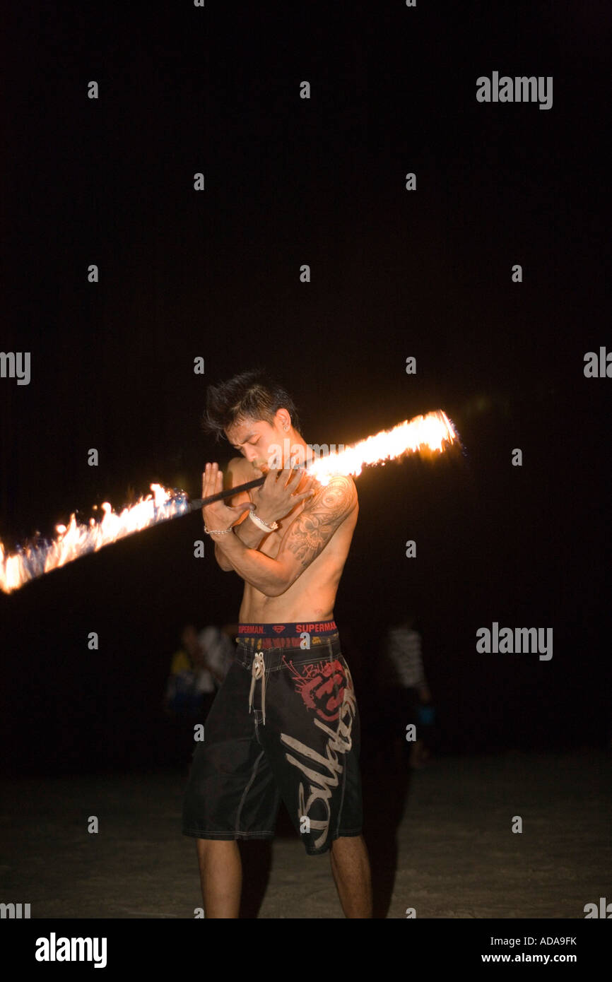 Young man juggeling with fire Full Moon Party Hat Rin Nok Sunrise Beach ...