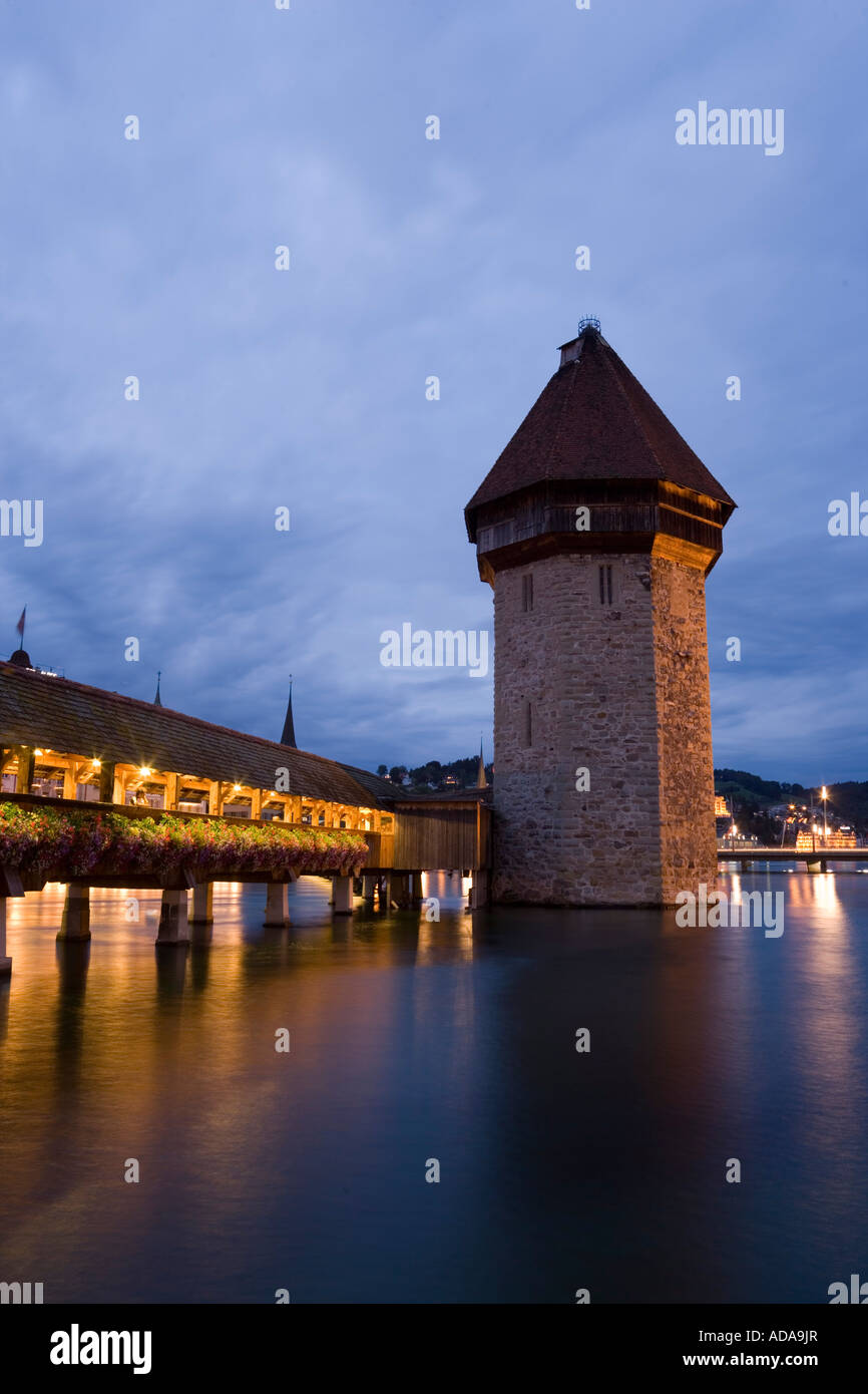 River Reuss with illuminated Kapellbruecke chapel bridge oldest covered ...