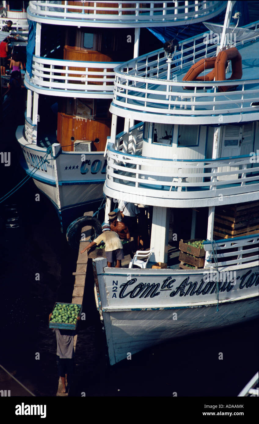 Loading Amazon river boats in the floating harbour of Manaus Amazonia ...