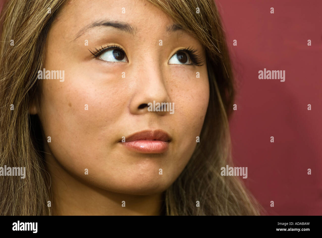 Headshot of a pretty young Asian woman Stock Photo - Alamy
