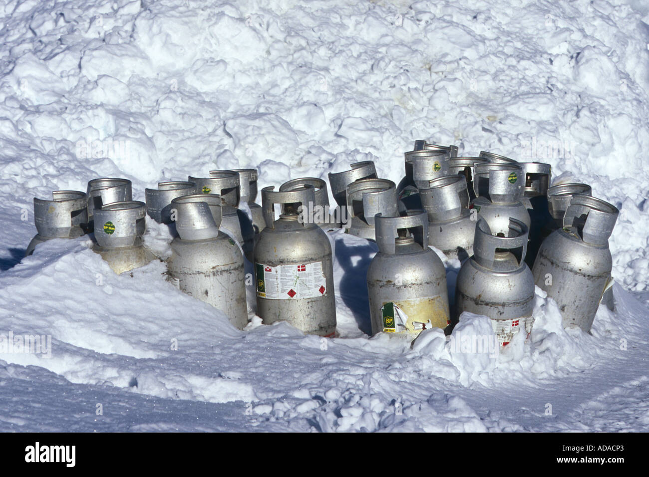 gas bottles in the ice during wintertime, Greenland Stock Photo - Alamy