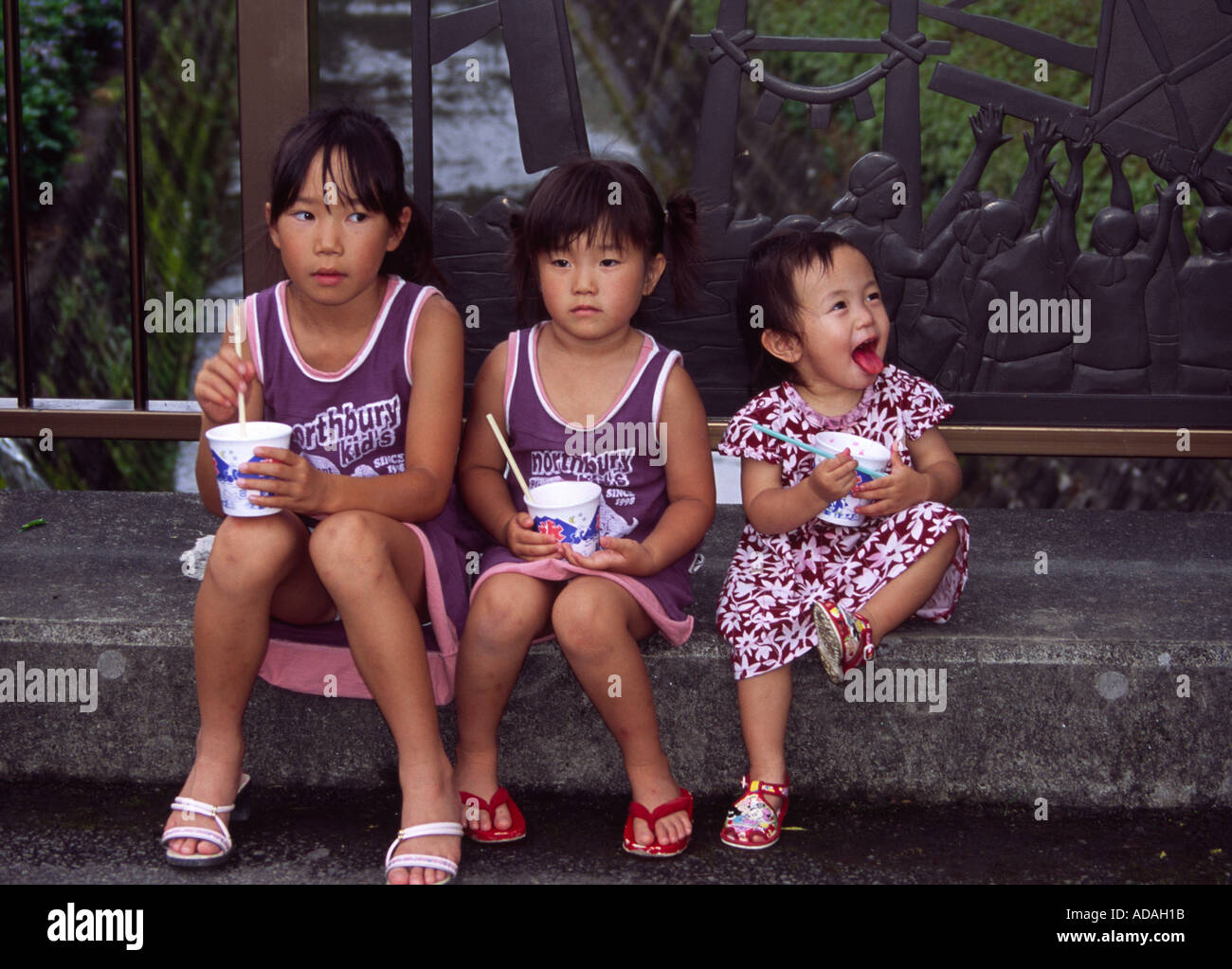 Japanese children enjoy drinks at festival. Japan Stock Photo - Alamy
