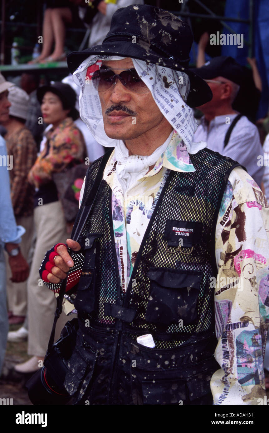 Japanese cameraman watching a festival. Japan Stock Photo - Alamy