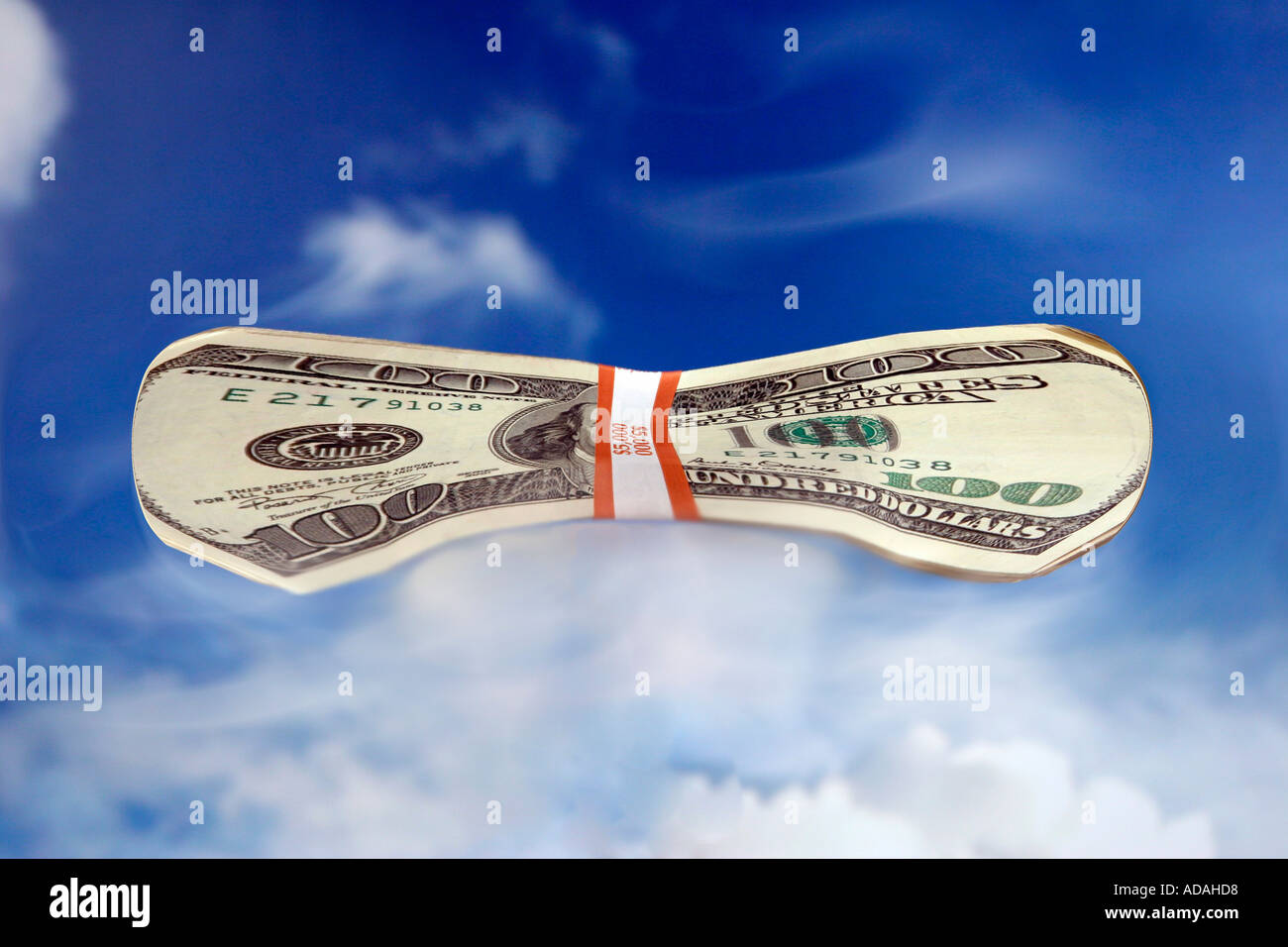 Symbols of Stretching Your Money Pulling at Both Ends Stock Photo - Alamy