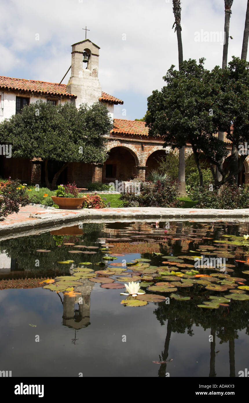 Bell tower reflected in the fountain on the Central courtyard, Mission ...
