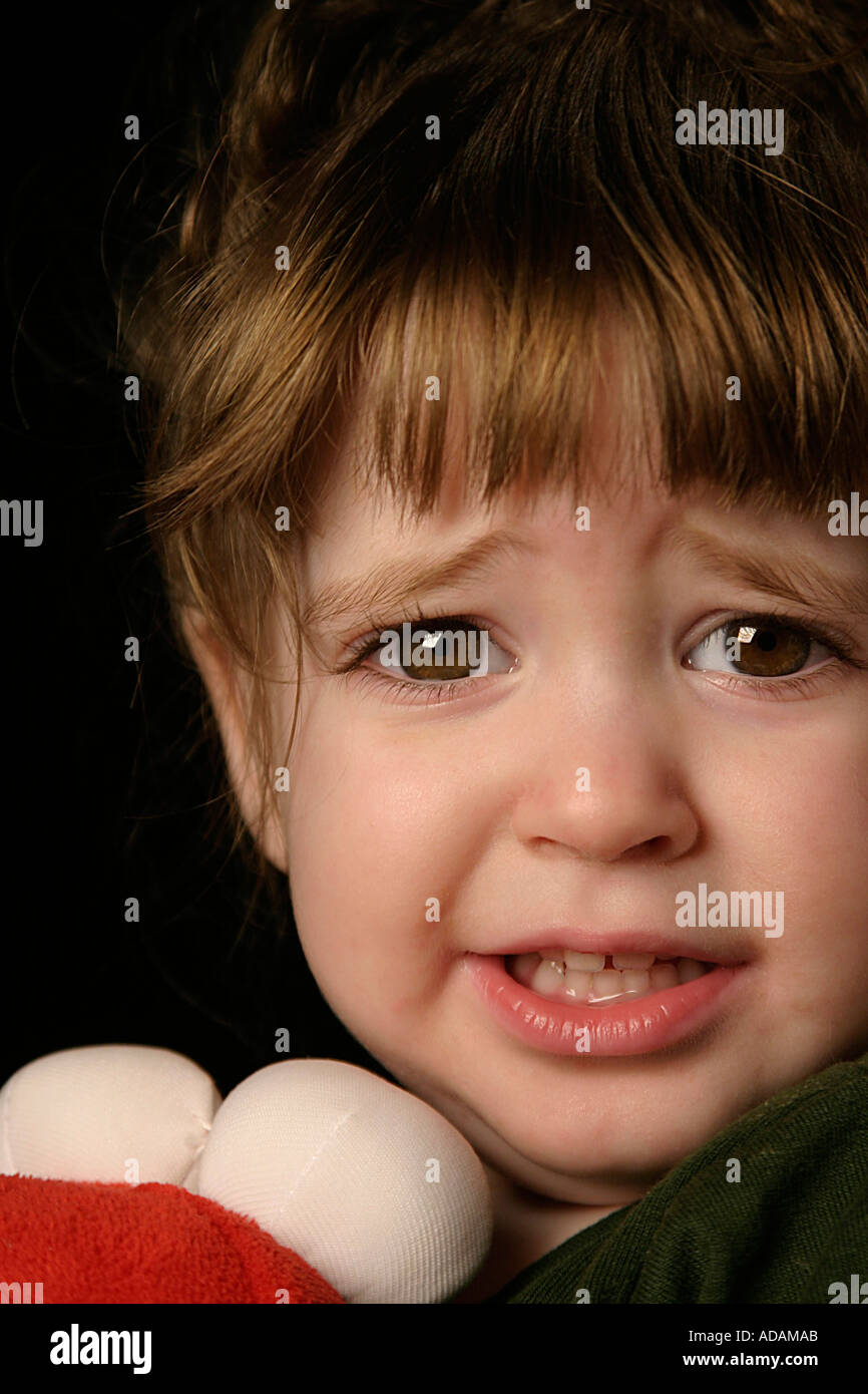 Cute Little Girl With Anxious Expression Stock Photo - Alamy