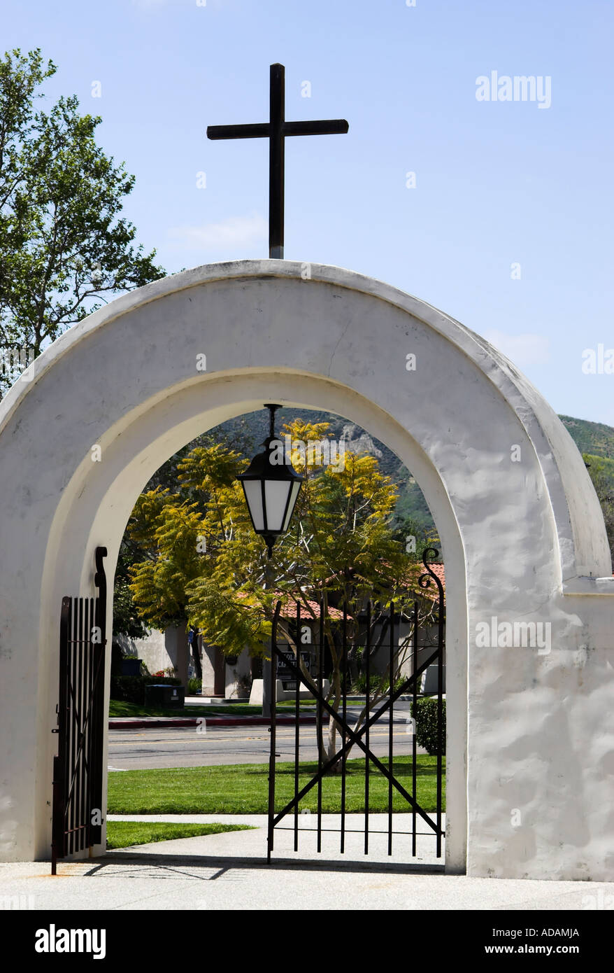 Cross over a gate, Mission Basilica San Juan Capistrano, California ...