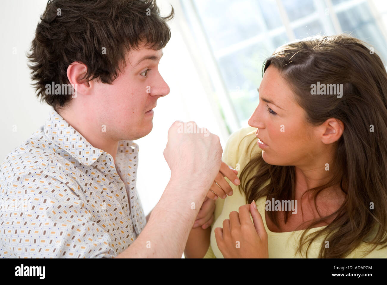 Couple domestic violence abuse threaten Stock Photo - Alamy