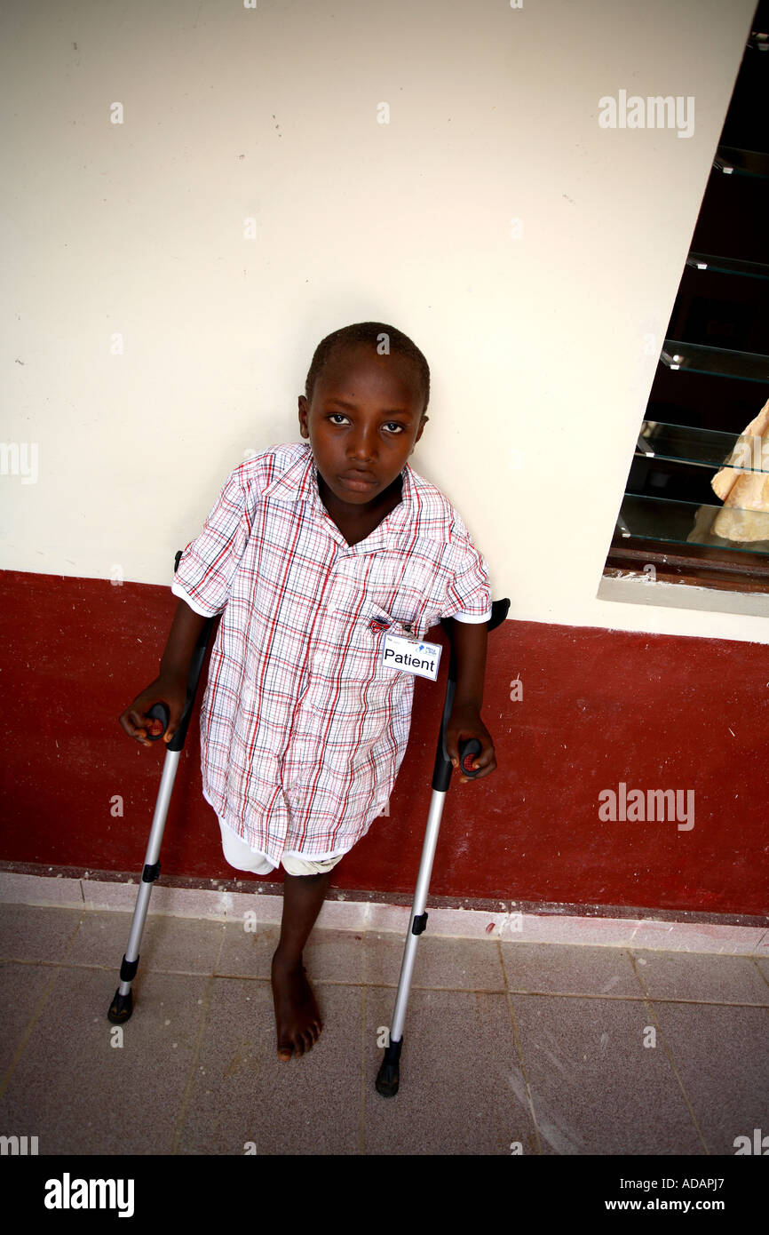 Vertical colour portrait of young disabled boy polio patient on ...