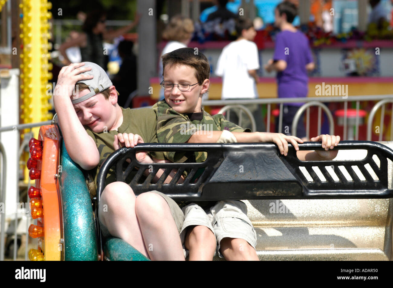 Real People on local carnival rides for fun during summer vacations at ...