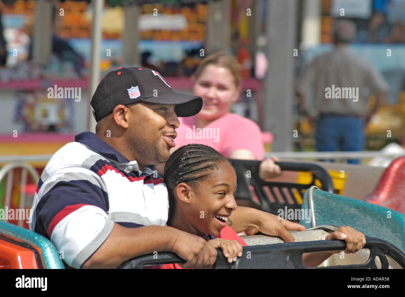 Real People on local carnival rides for fun during summer vacations at ...