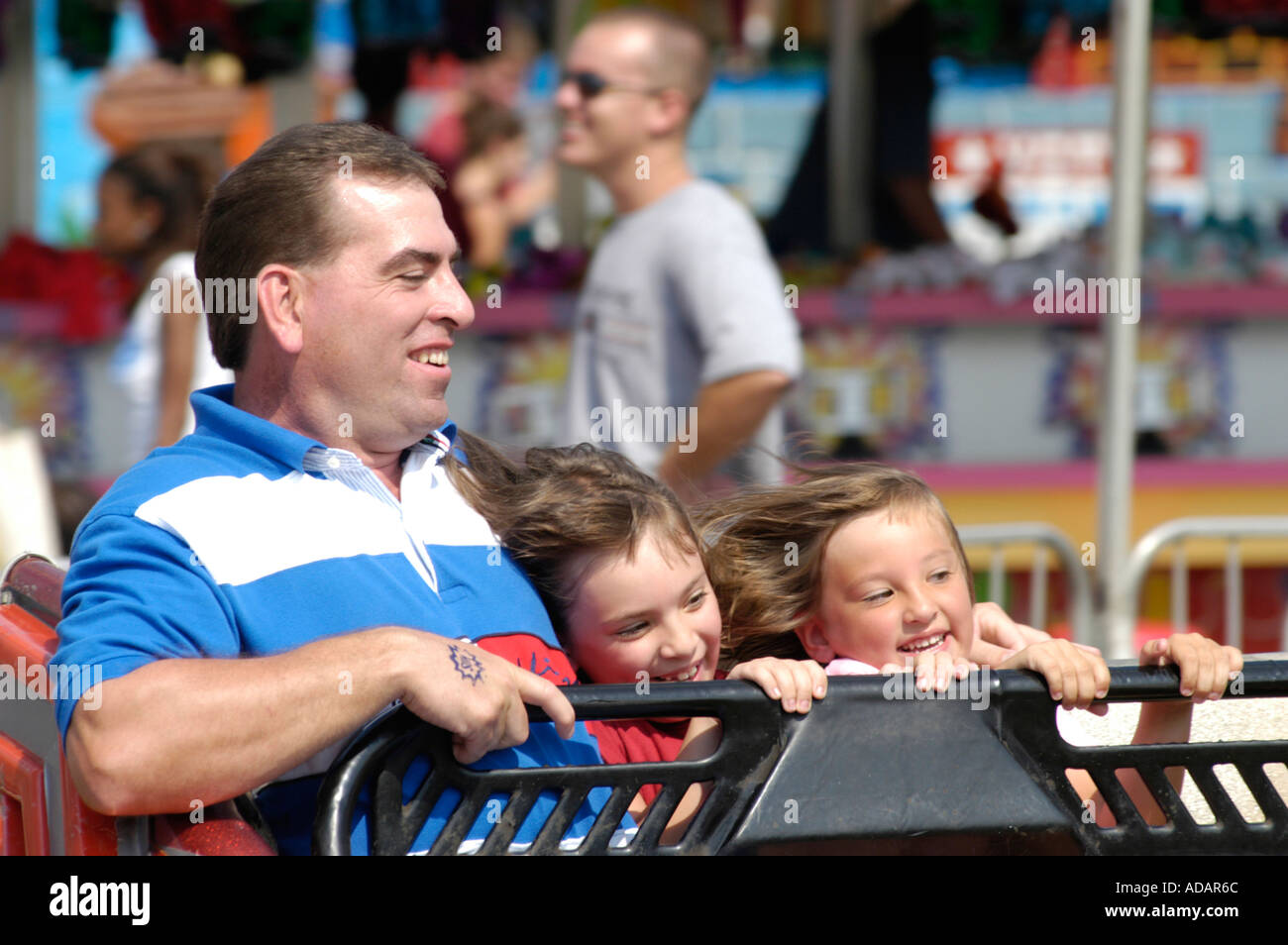 Real People on local carnival rides for fun during summer vacations at ...