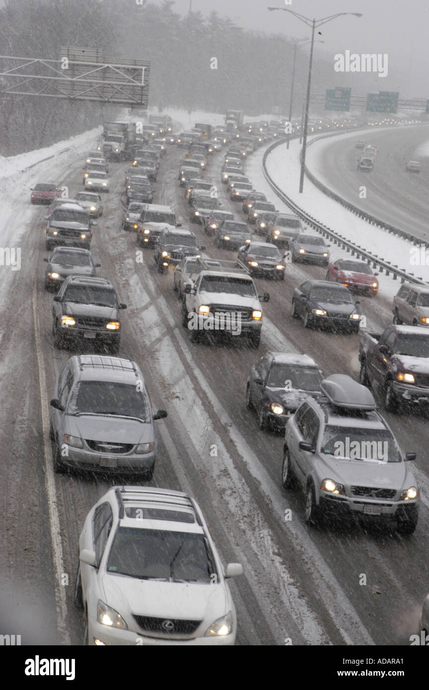Highway clogged with cars during snow storm Stock Photo - Alamy