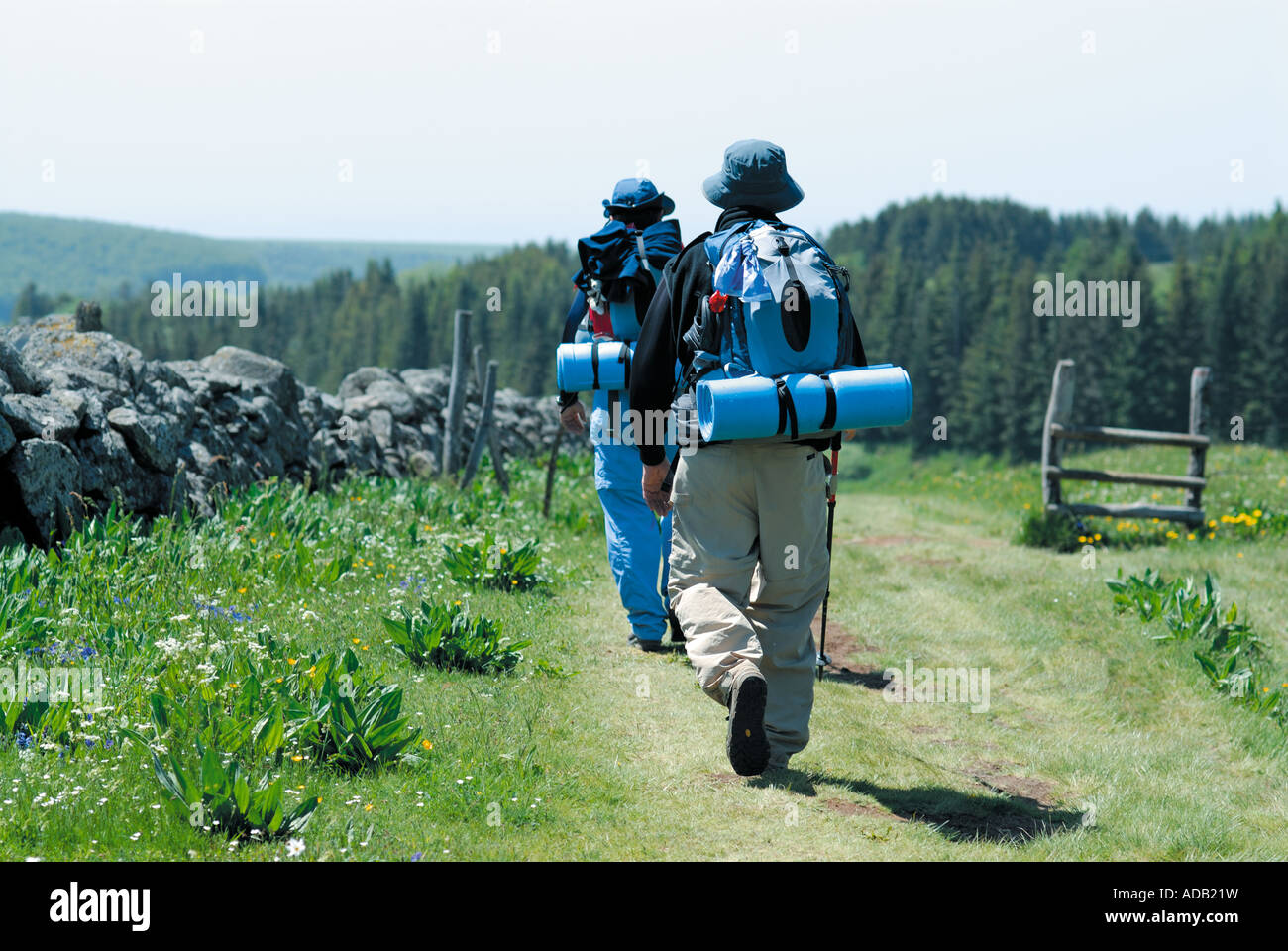 Couple of Pilgrims at the way from Le Puy to Aubrac, oficial stop of ...