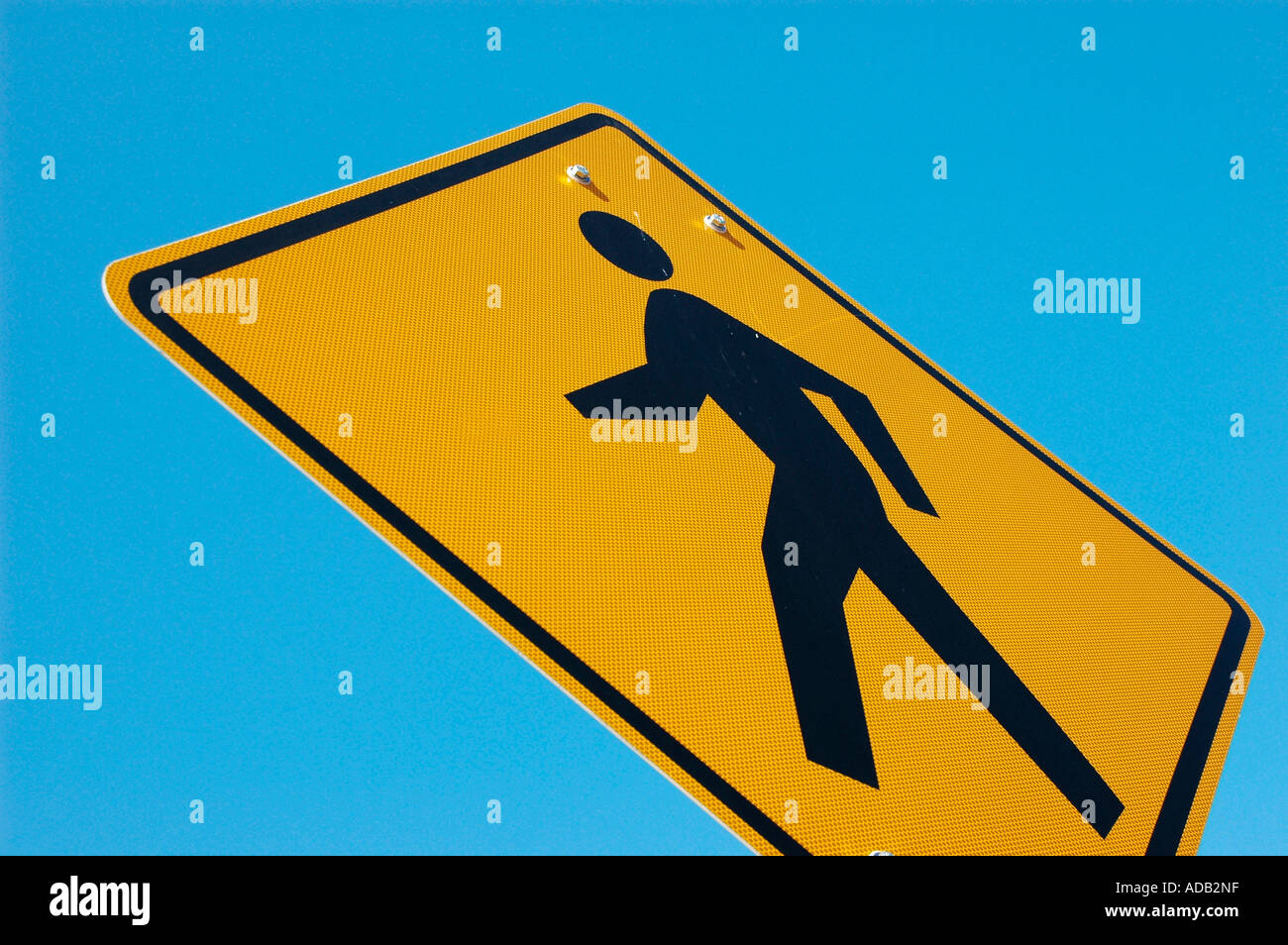 Pedestrian walking sign on street crossing for caution at path for ...