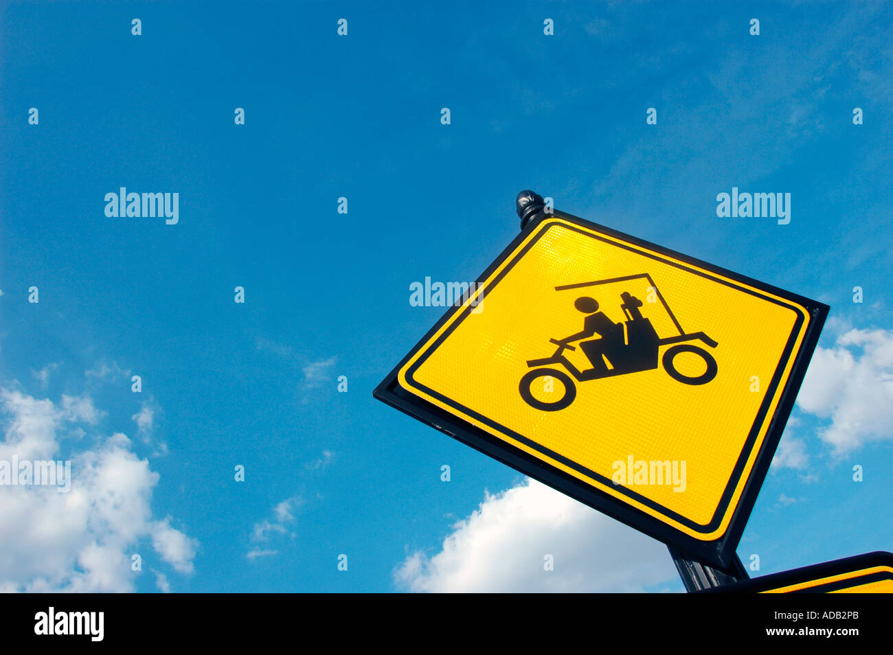 Golf cart crossing ahead sign at Golf Club Coarse for safety of all in ...