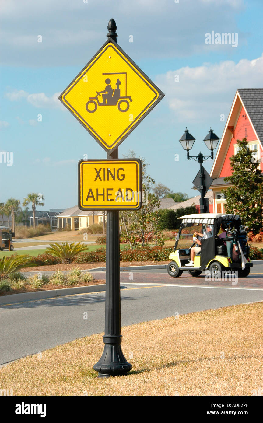 Golf cart crossing ahead sign at Golf Club Coarse for safety of all in ...