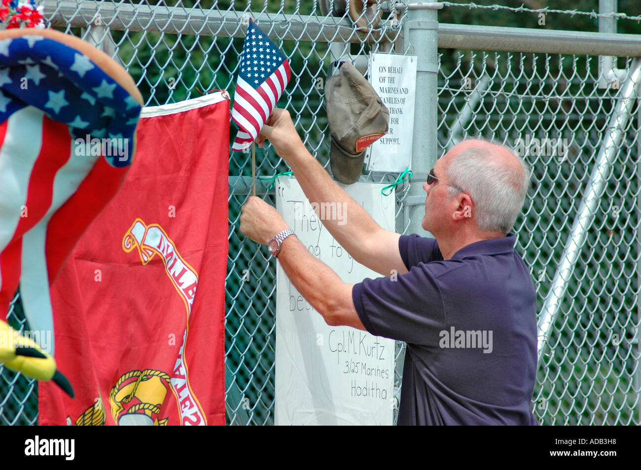 Friends and family grieving at memorial for 14 Marines Killed in Iraq ...