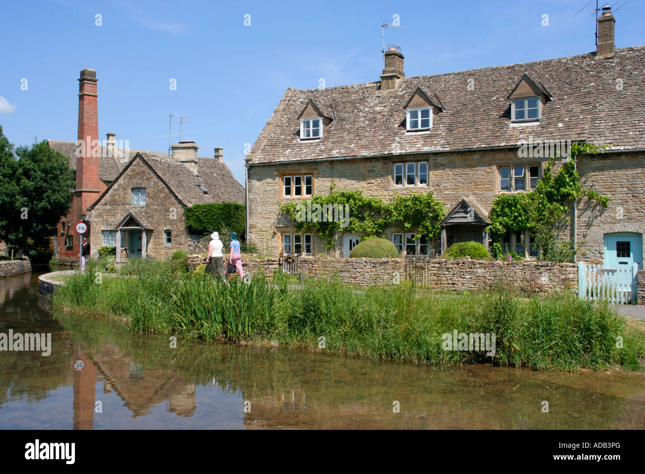 Lower Slaughter quaint village by stream cotswolds stone houses england ...