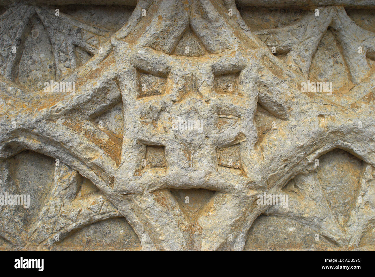 Detail of sculpted stone work, at the entrance to the gothic church of ...