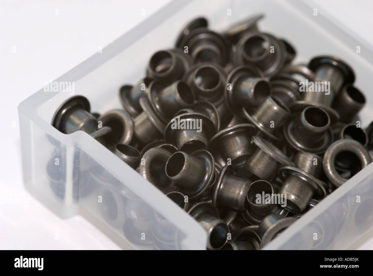 Box of metal eyelets used in scrapbooking and other papercrafts Stock ...