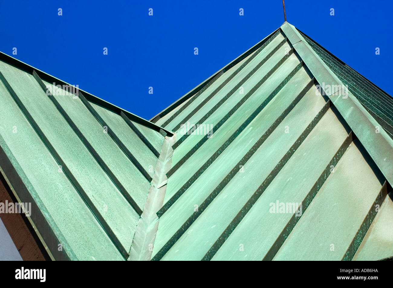 Converging and diagonal lines create this unique image of a roof detail ...